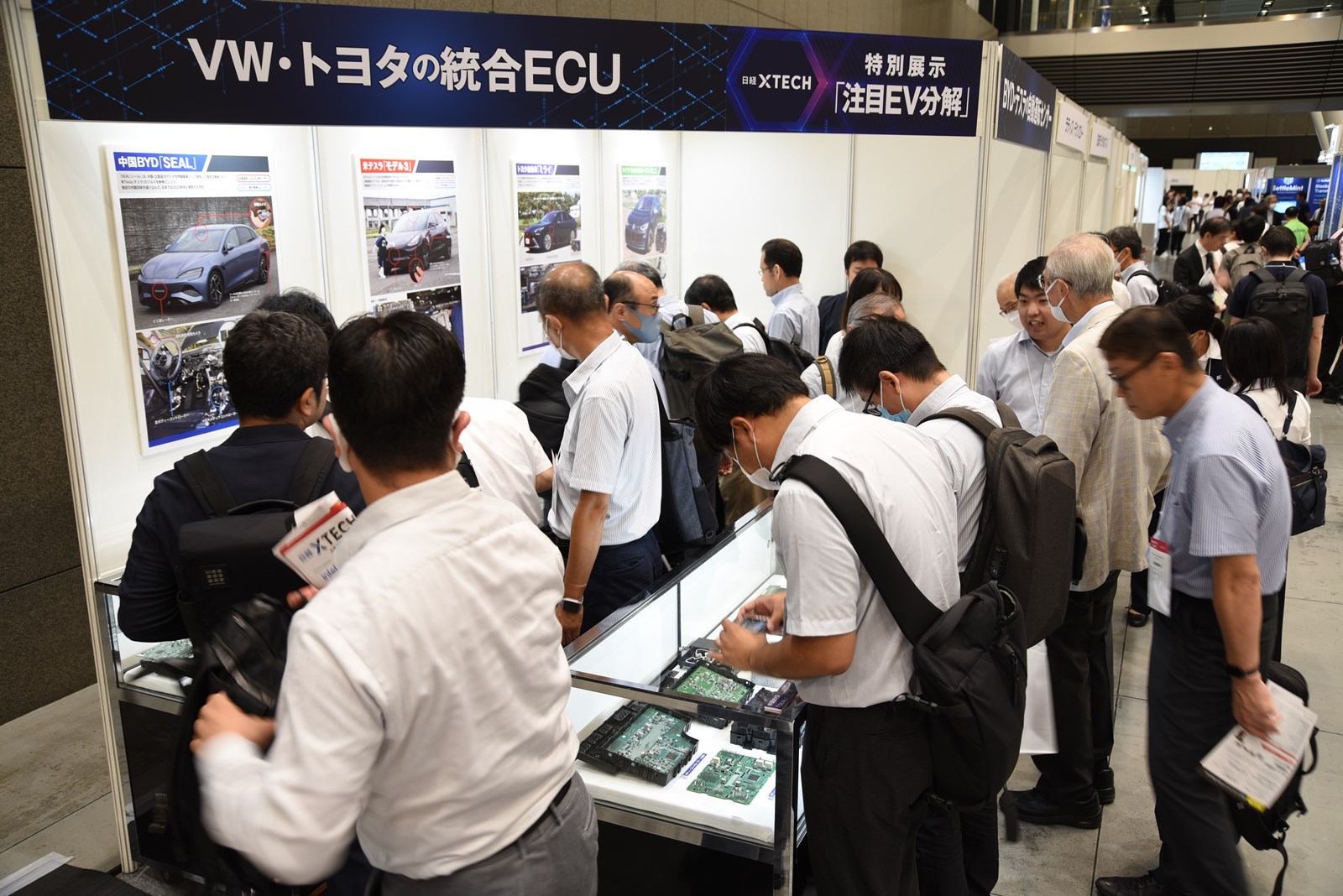 「初」の4車種展示、BYD・テスラ・VW・トヨタの分解部品ずらり | 日経クロステック（xTECH）